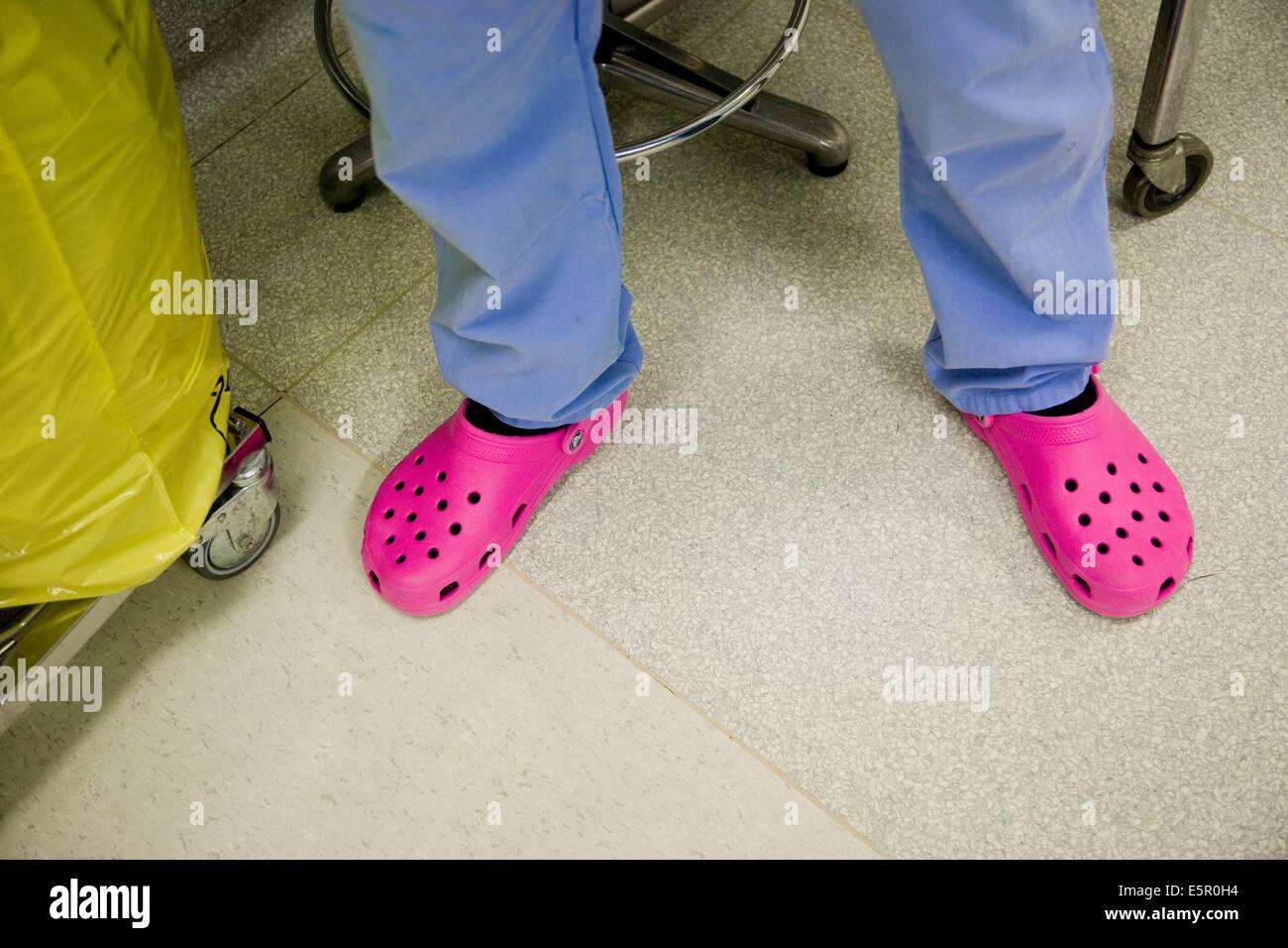Nurse wearing plastic shoes at hospital Stock Photo - Alamy