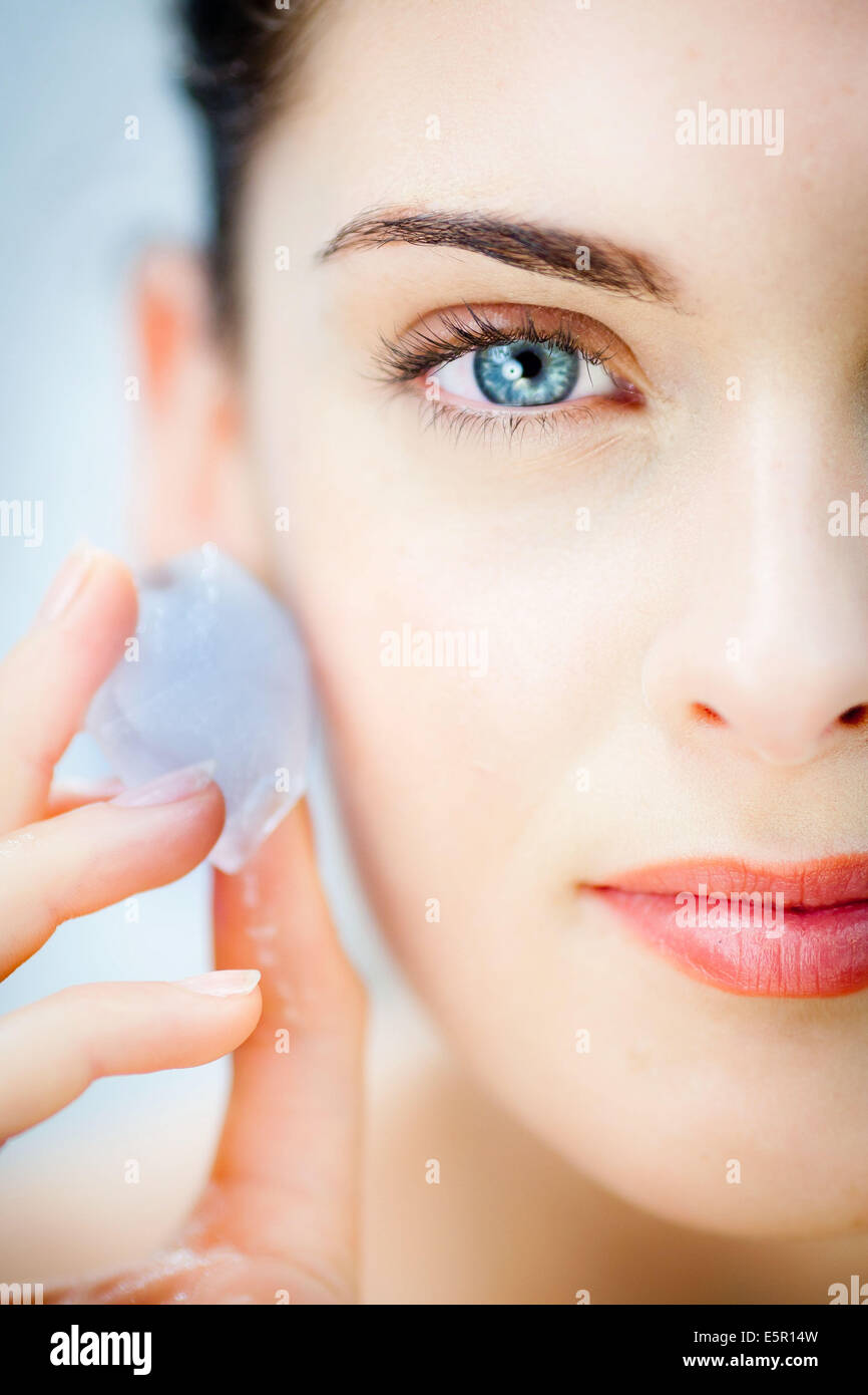 Woman face ice cube hi-res stock photography and images - Alamy