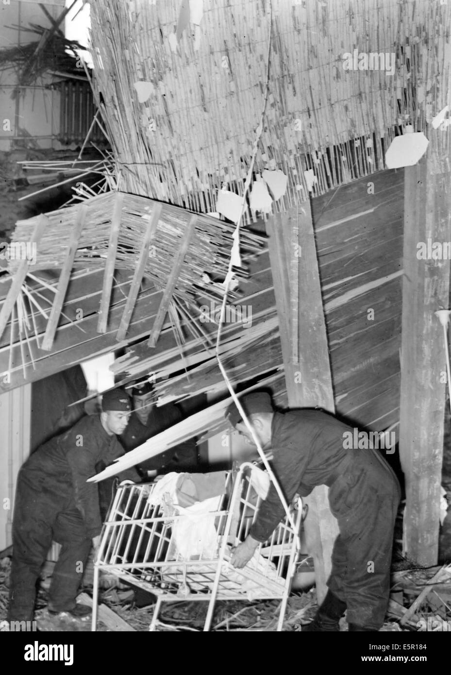 The picture from a Nazi news report shows salvage work at the hospital ...