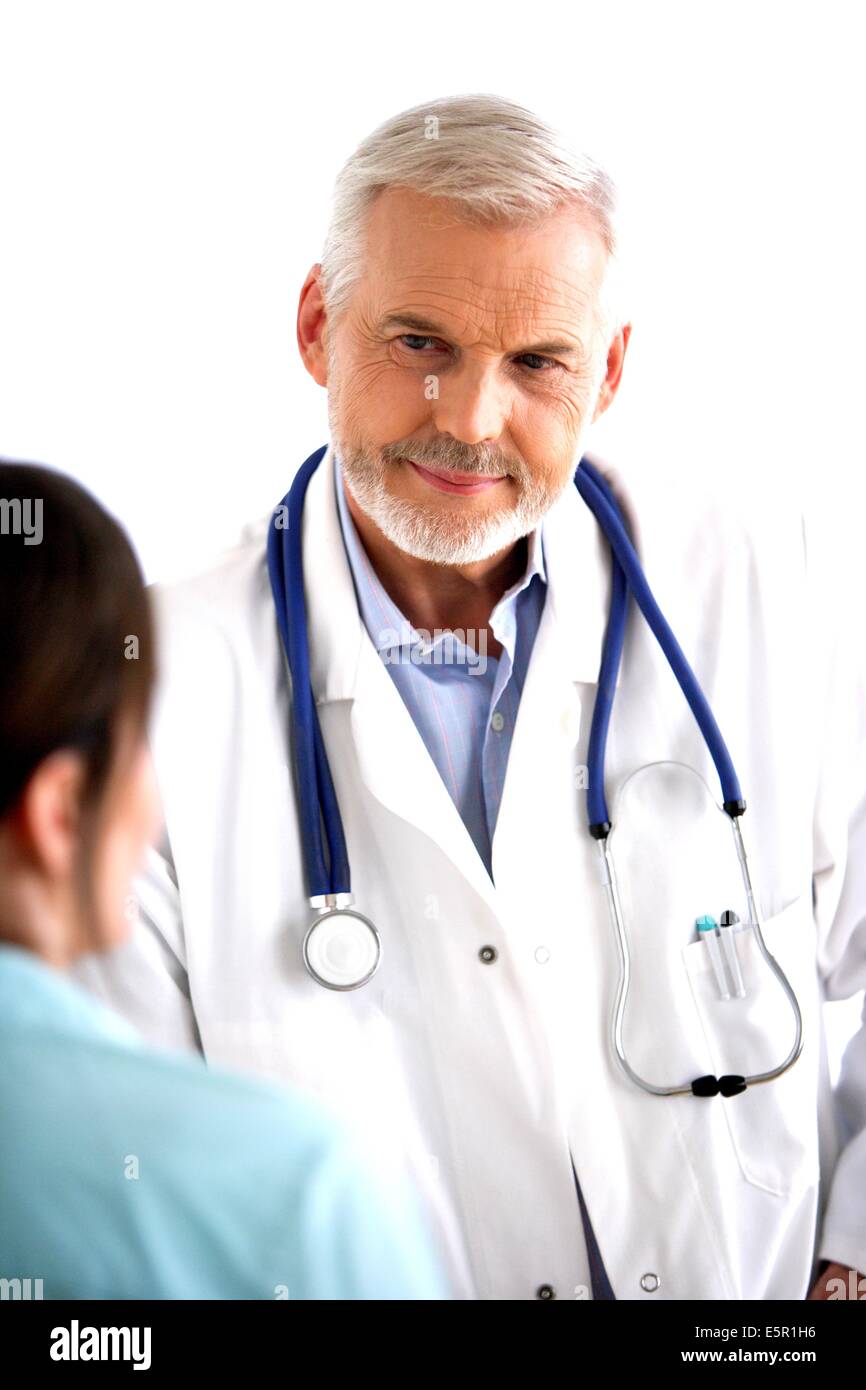 Hospital doctor with a patient Stock Photo - Alamy