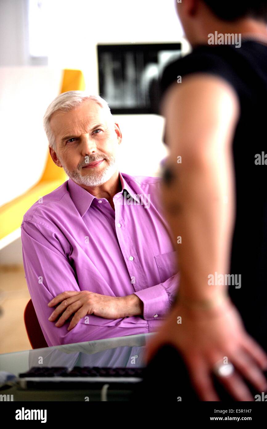 General practitioner with a patient Stock Photo - Alamy General practitioner with a patient Stock Photo - Alamy