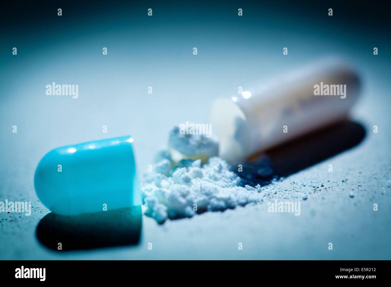 Opened drug capsule Stock Photo - Alamy