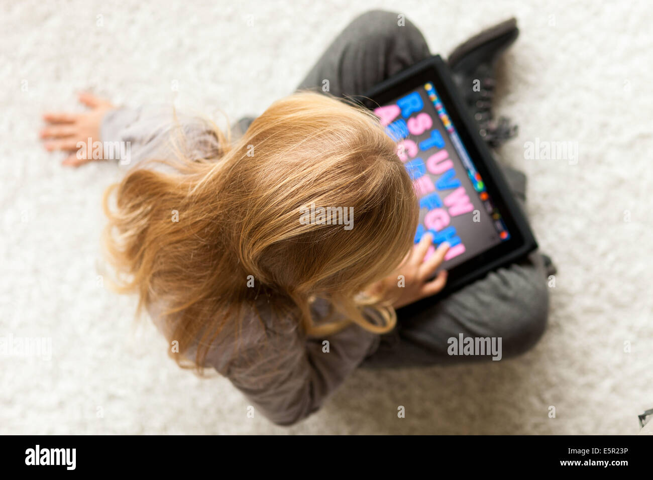 Girl ipad teen hi-res stock photography and images - Alamy