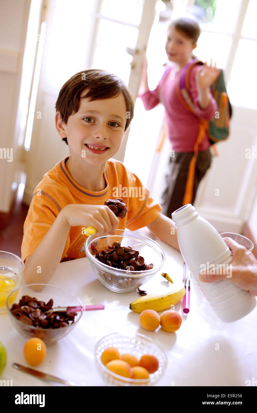 Children having breakfast Stock Photo - Alamy