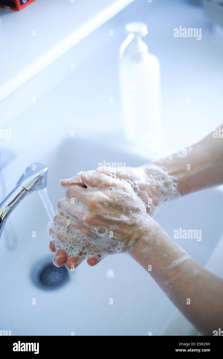 Staff washing hands Stock Photo - Alamy
