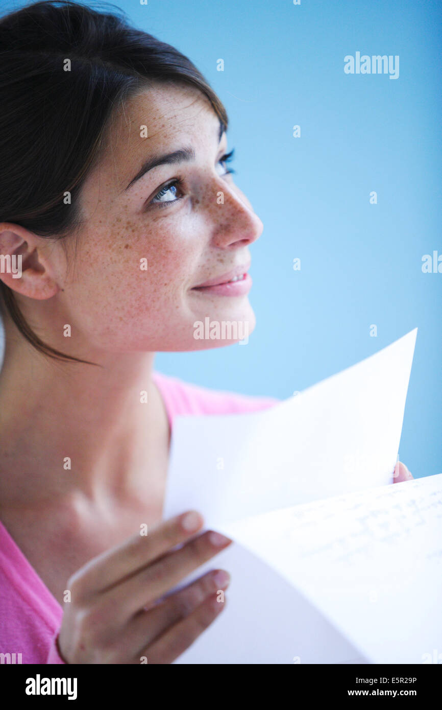 Woman reading her mail Stock Photo - Alamy
