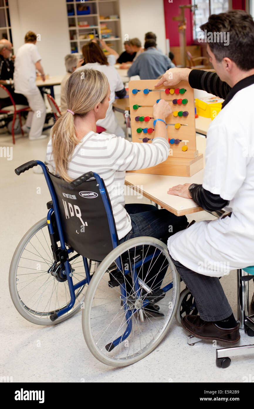 Functional rehabilitation of paralyzed on one side woman (model ...