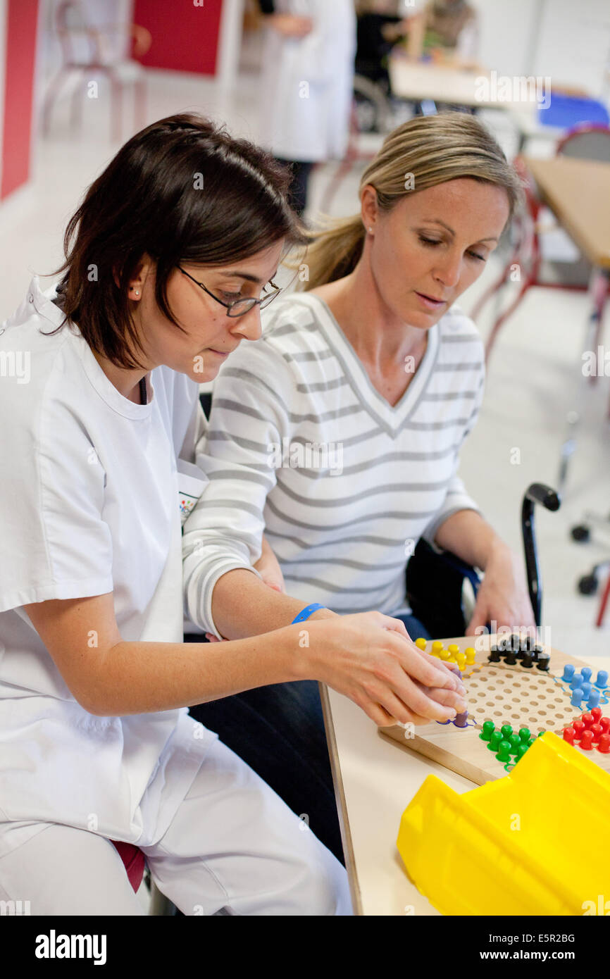 Functional rehabilitation of paralyzed on one side woman (model ...