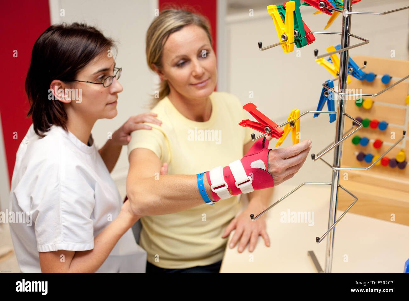 Functional rehabilitation of paralyzed on one side woman (model ...