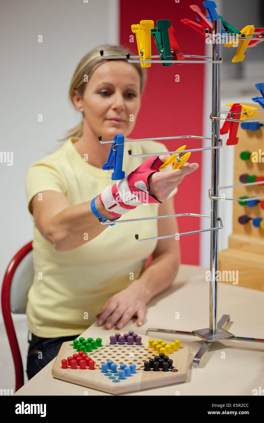 Functional rehabilitation of paralyzed on one side woman (model ...