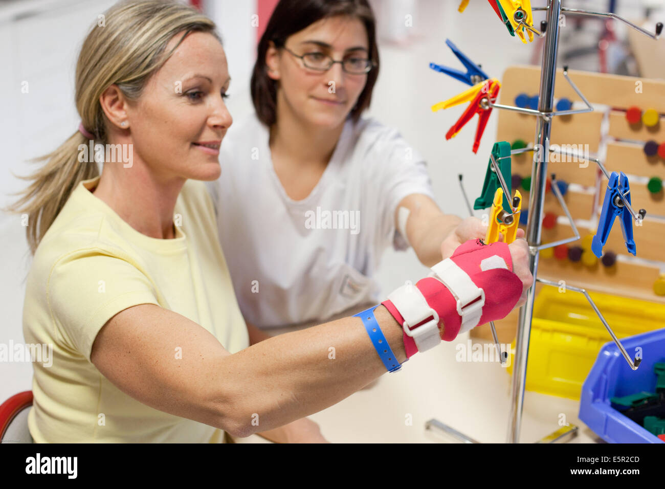 Functional rehabilitation of paralyzed on one side woman (model ...
