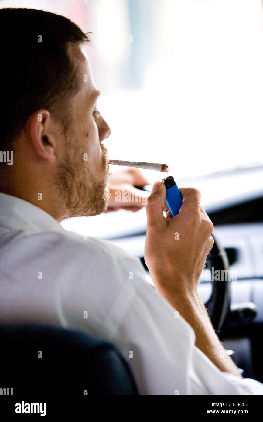 Man smoking car hi-res stock photography and images - Alamy