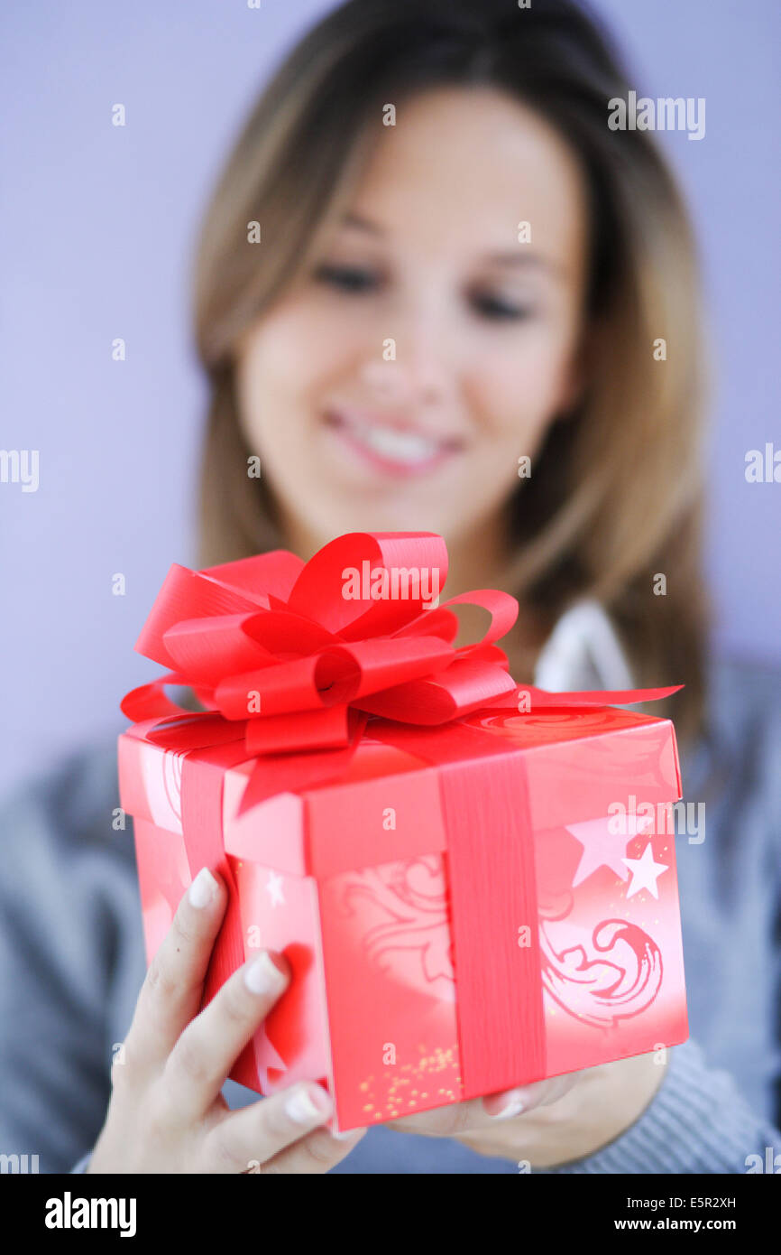 Woman receiving a present Stock Photo - Alamy