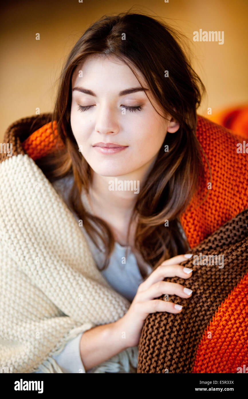 Woman wrapped in wool blanket Stock Photo - Alamy