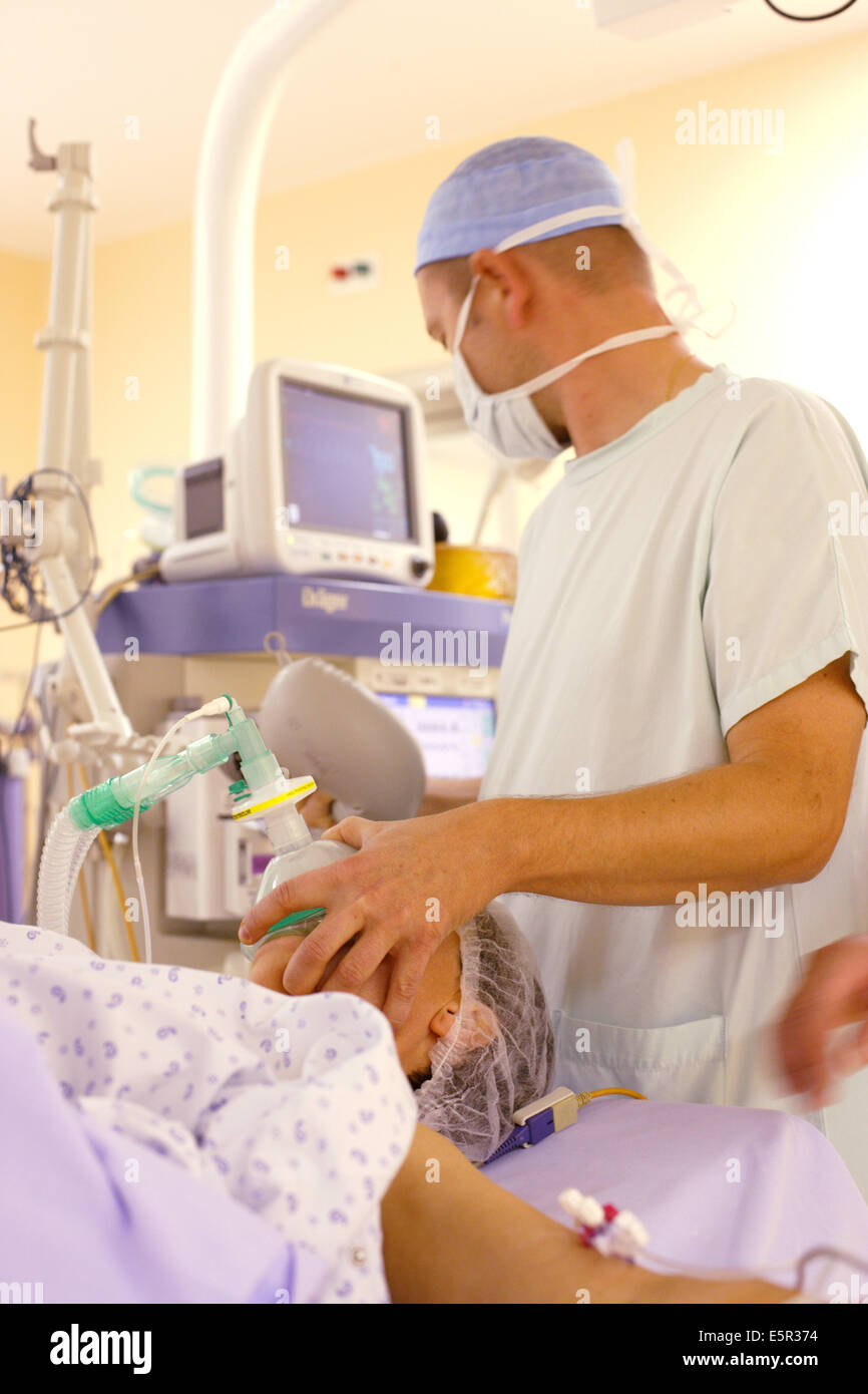 Anesthesiologist attenting patient during surgery, Department of ...