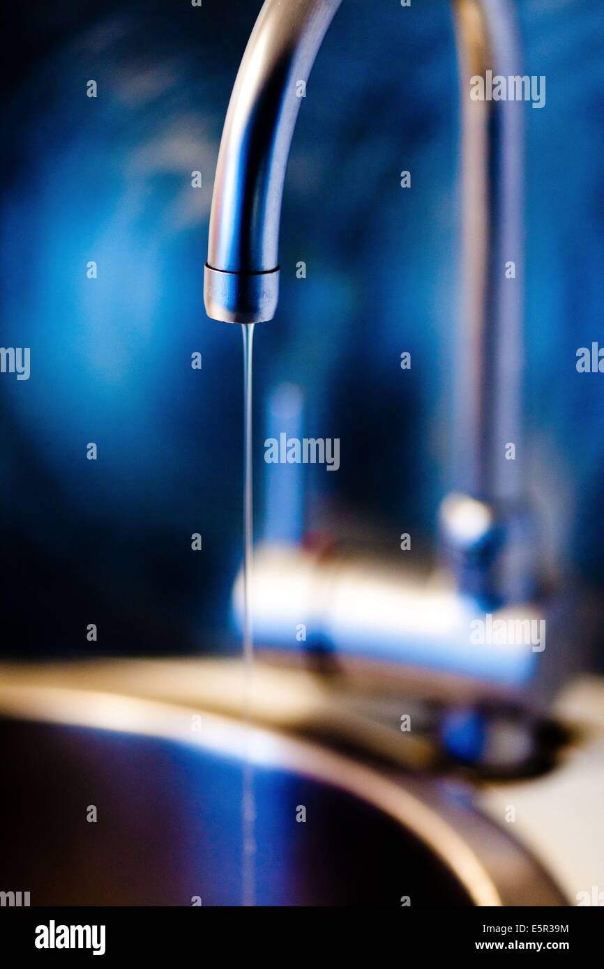 Water dripping from tap Stock Photo - Alamy
