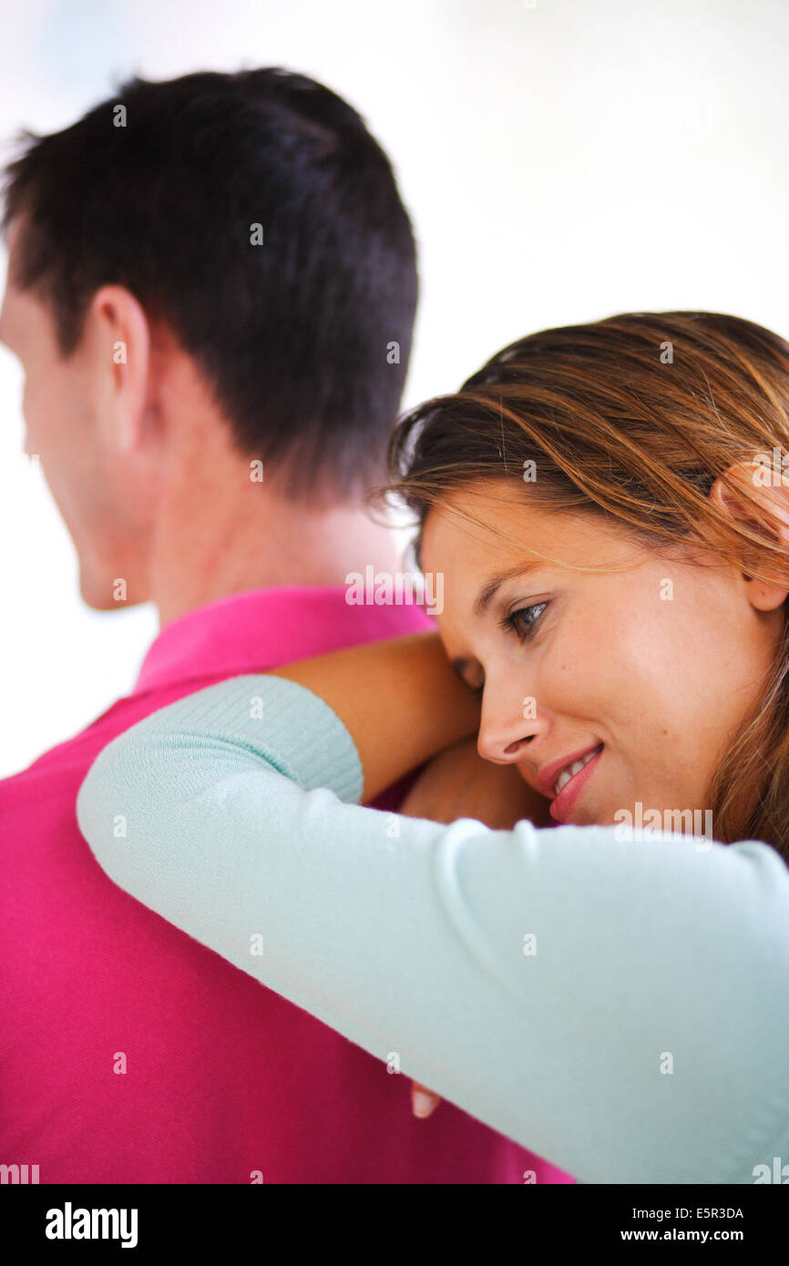 Woman bending on the back of her partner Stock Photo - Alamy