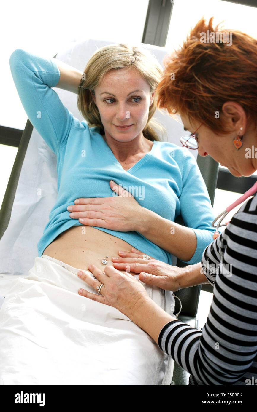 Navel woman lying hi-res stock photography and images - Alamy