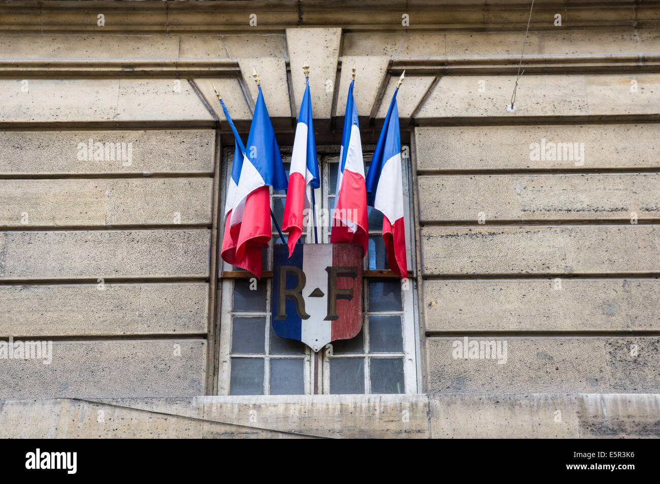 French flags with RF logo hanging on government building wall in Paris ...