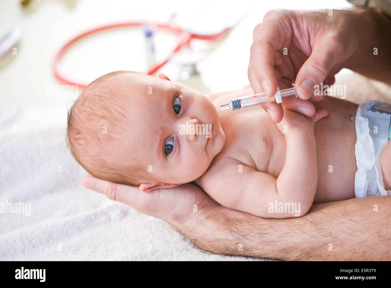 2 month old baby receiving Rotarix vaccination against gastroenteritis ...