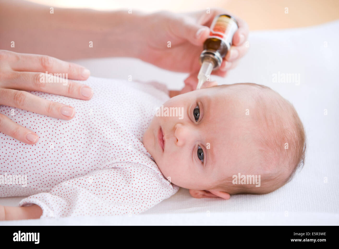 Baby ear drops hi-res stock photography and images - Alamy