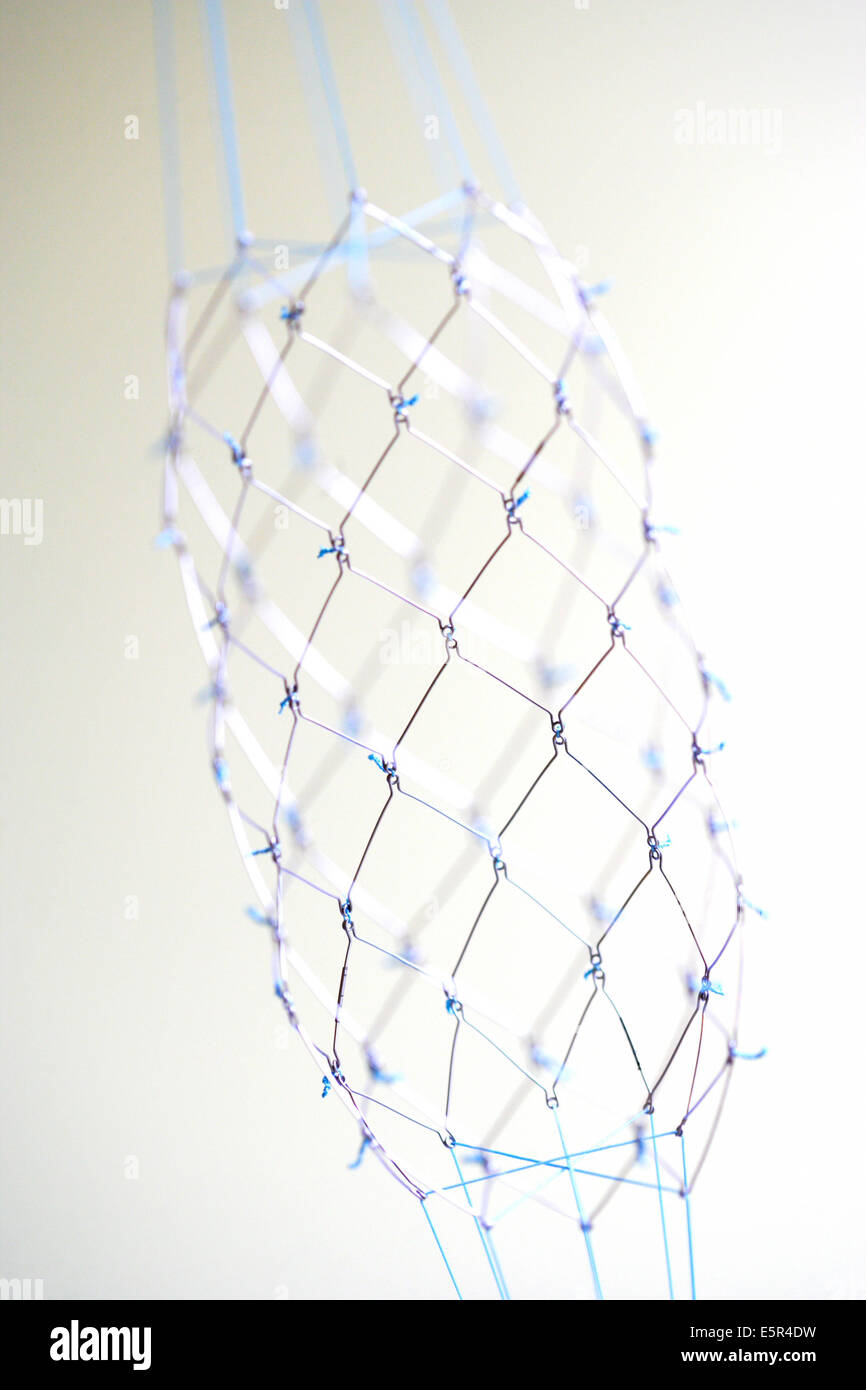 Surgery to treat aortic lesions with custom-made endovascular implants ...