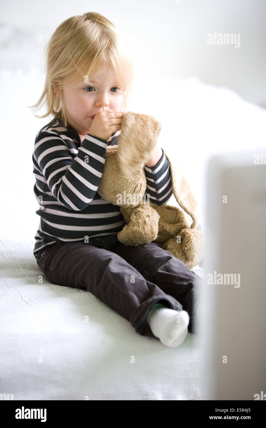 30 month old girl watching television Stock Photo - Alamy