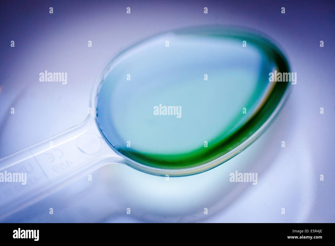 Spoonful of syrup Stock Photo - Alamy