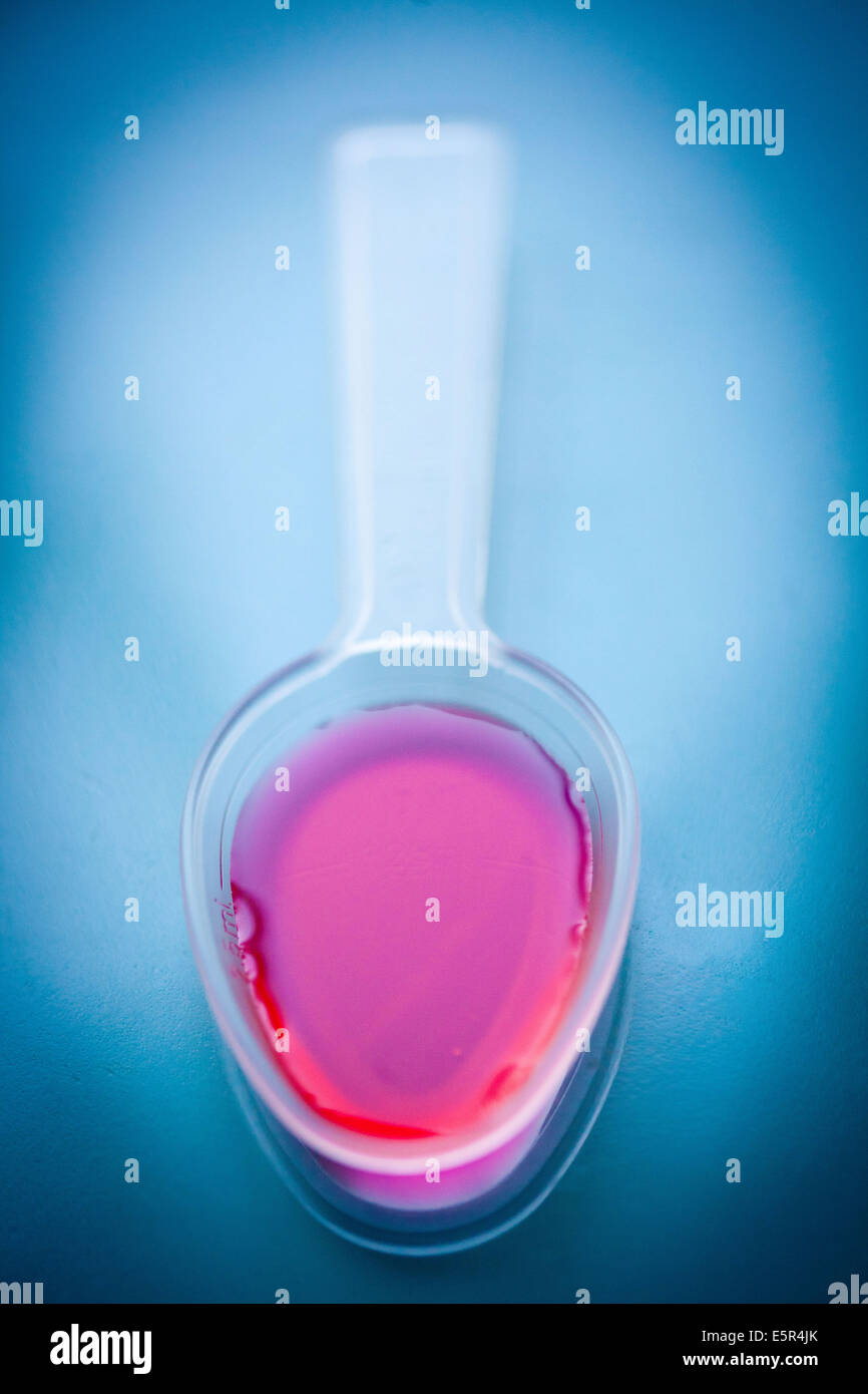 Spoonful of syrup Stock Photo - Alamy