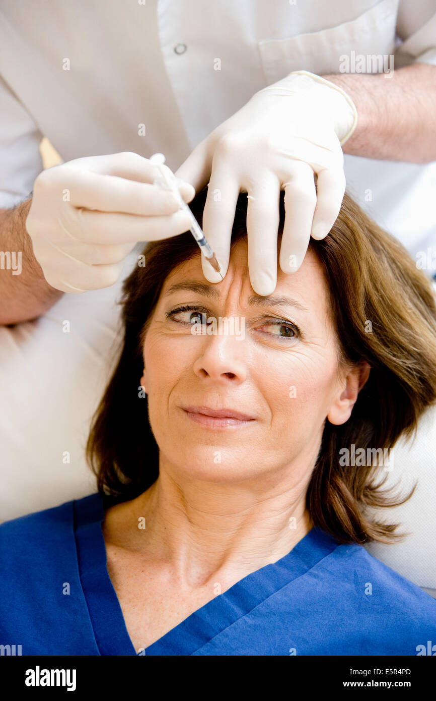 Treatment of wrinkles with Botox injections Stock Photo - Alamy