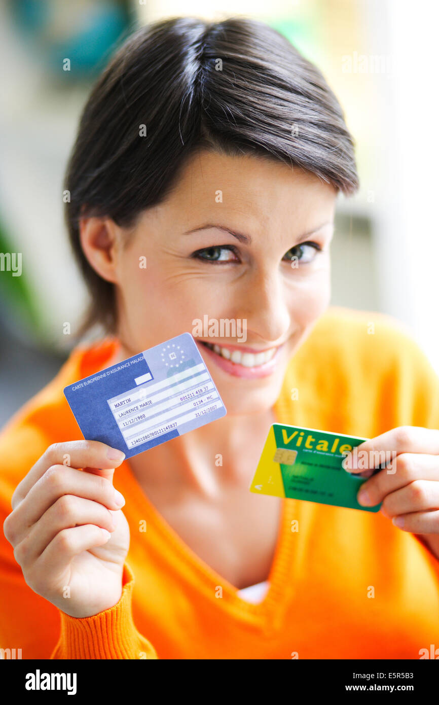 Woman with European Health Insurance Card Stock Photo - Alamy