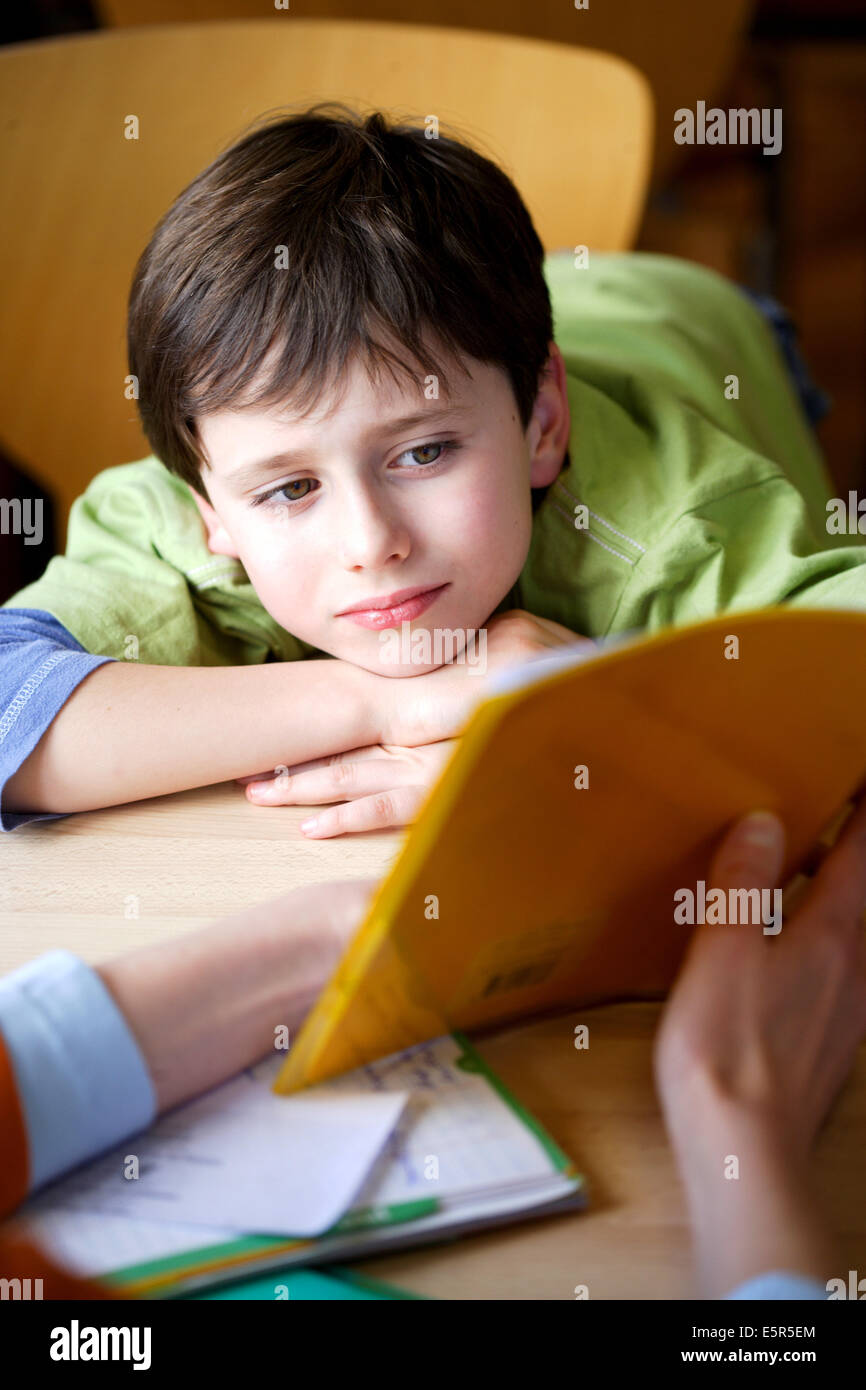 8 year old boy working Stock Photo - Alamy