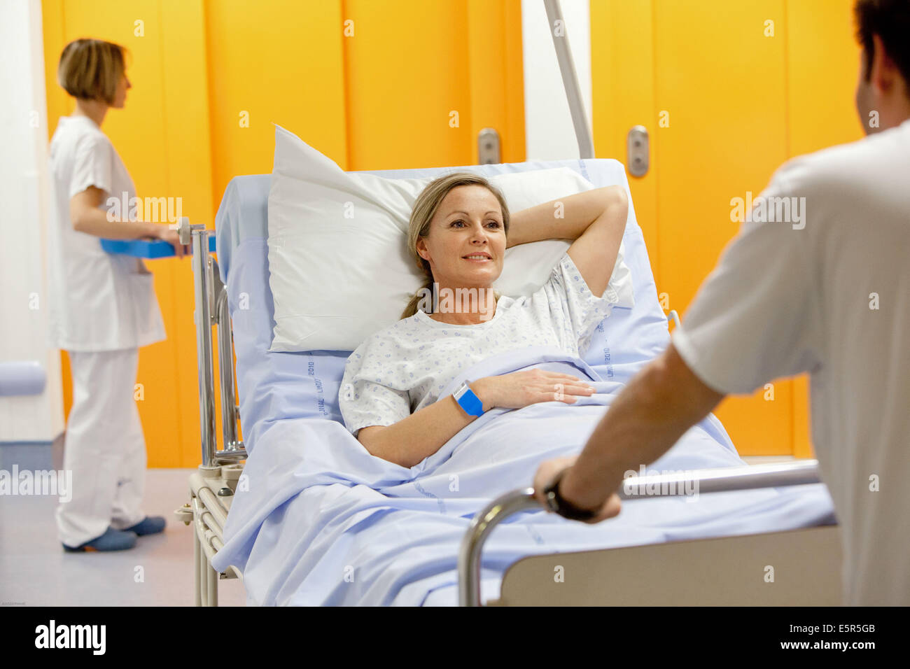 Woman lying on a stretcher, Limoges hospital, France Stock Photo - Alamy