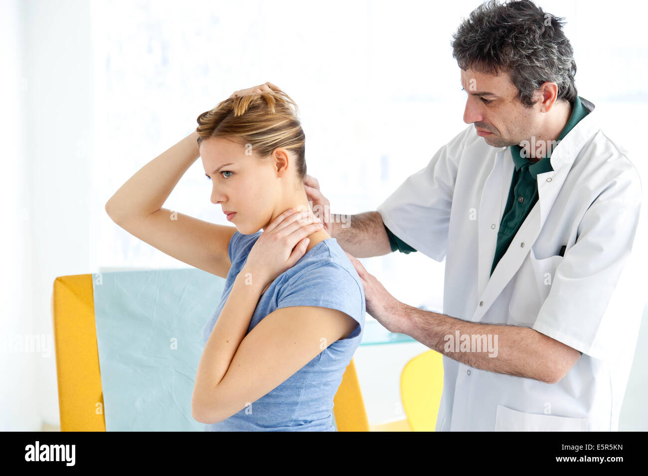 Woman undergoing medical consultation Stock Photo - Alamy