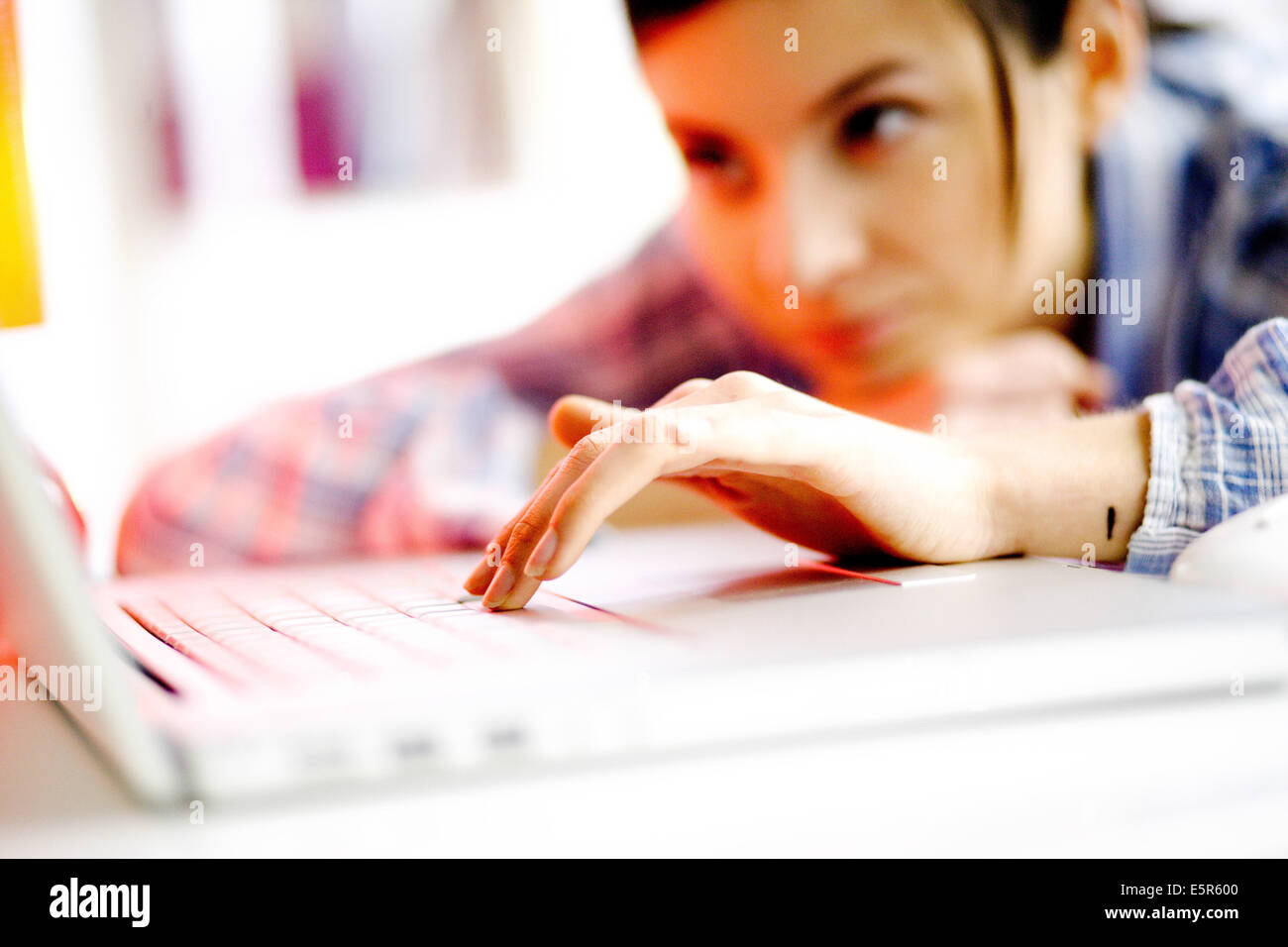 Woman using computer Stock Photo - Alamy