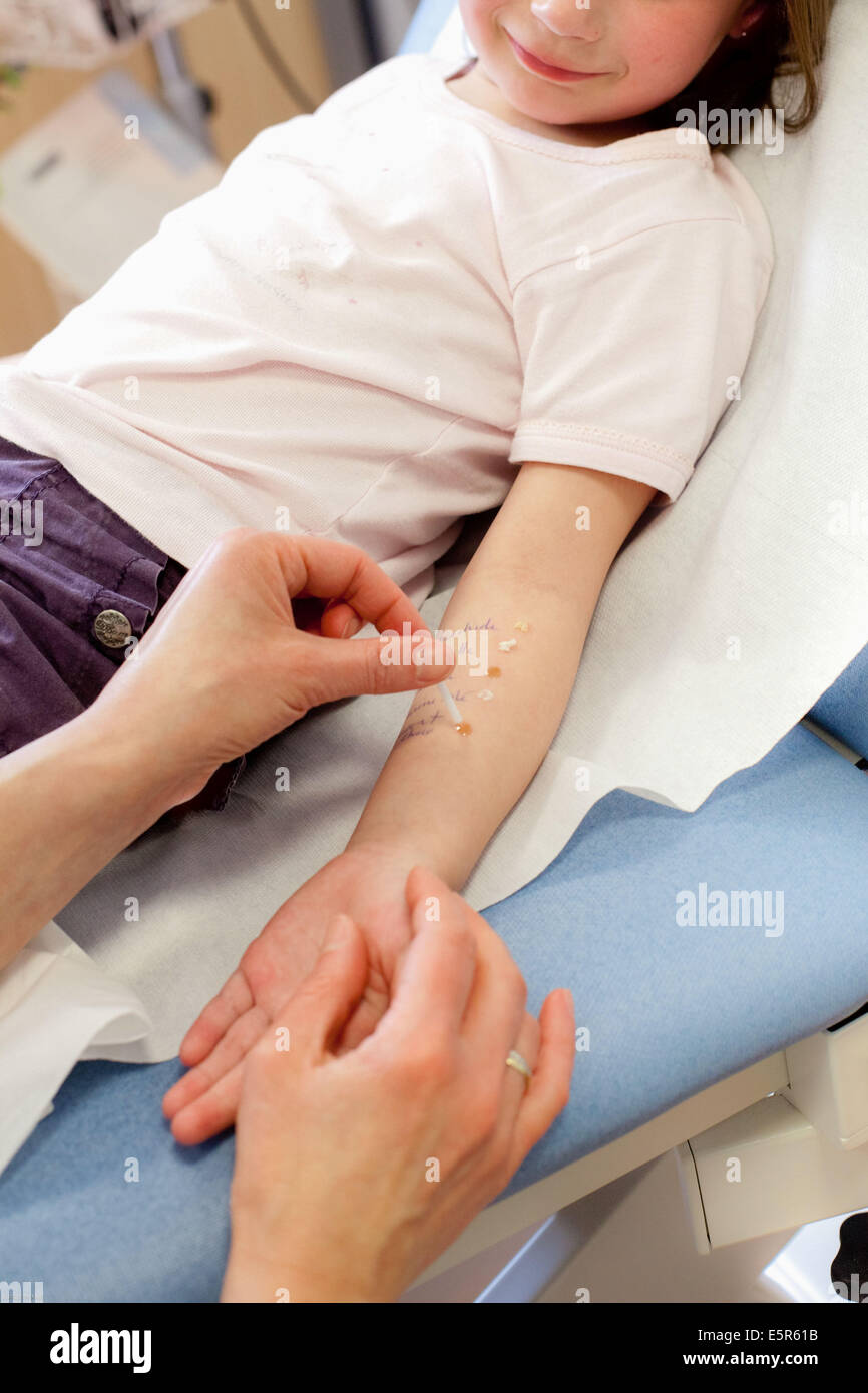 Child undergoing skin prick test for allergens screening, Limoges ...