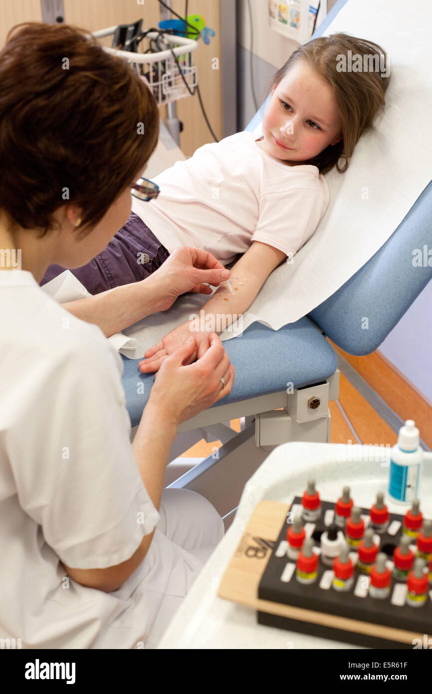 Child undergoing skin prick test for allergens screening, Limoges ...