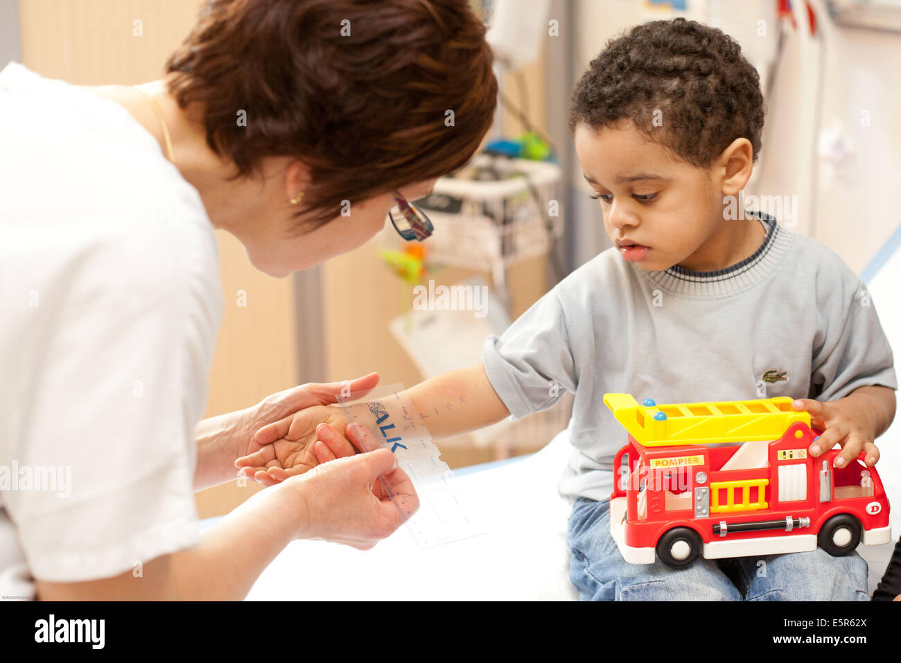 Child undergoing skin prick test for allergens screening, Limoges ...
