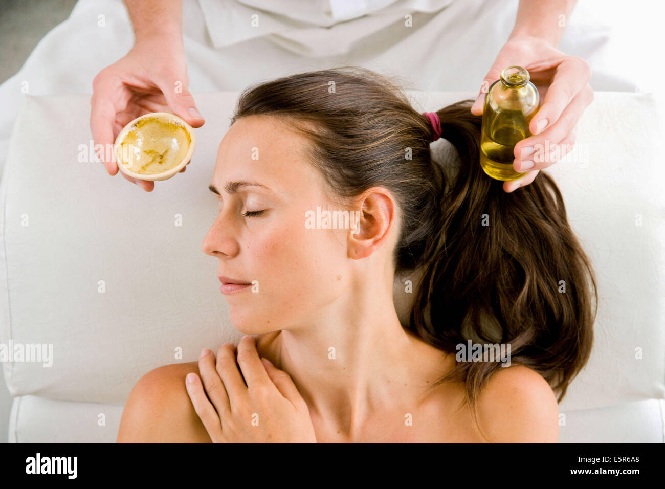 Woman face oil hi-res stock photography and images - Alamy