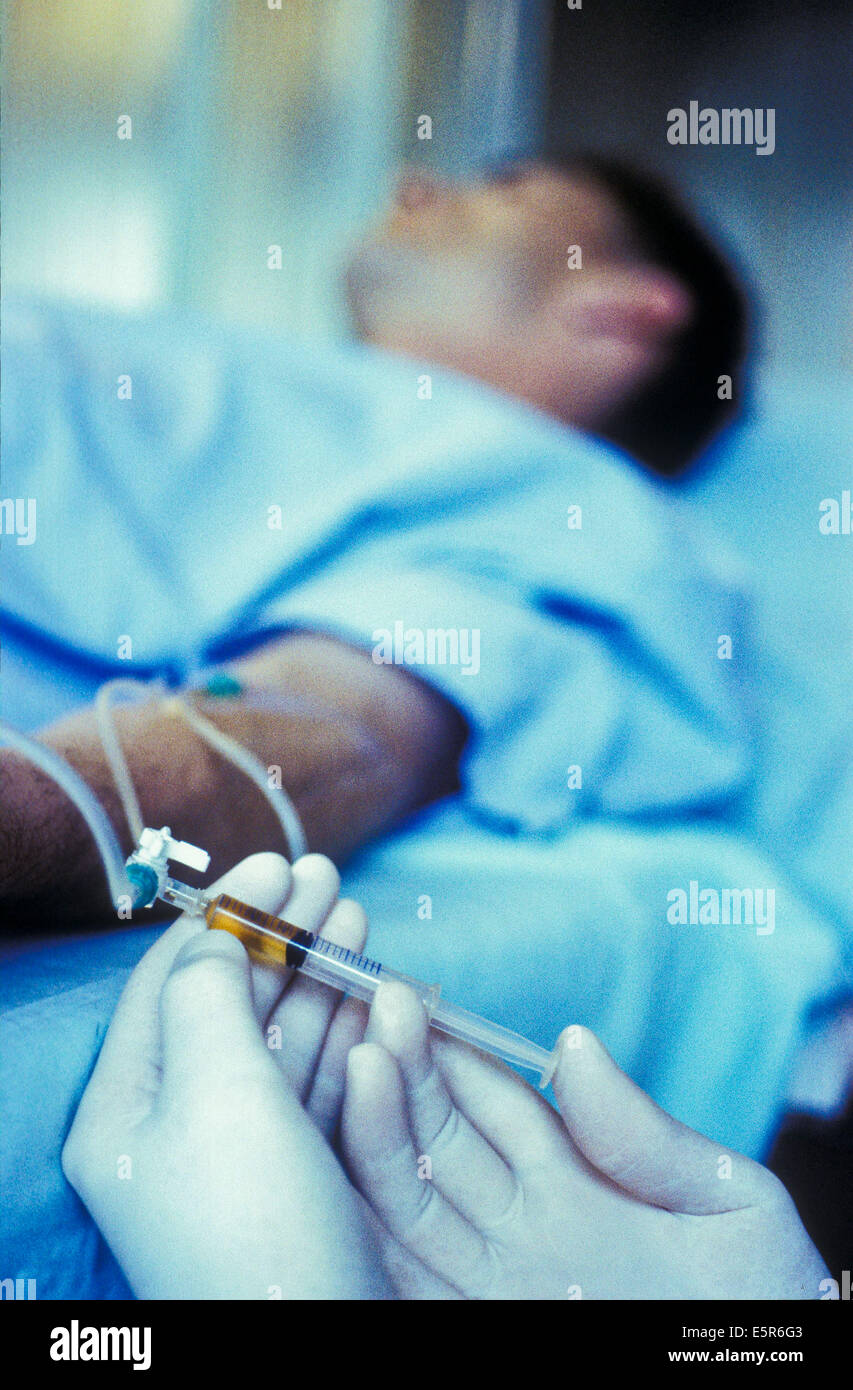 Euthanasia,Injection of drug in a drip Stock Photo - Alamy