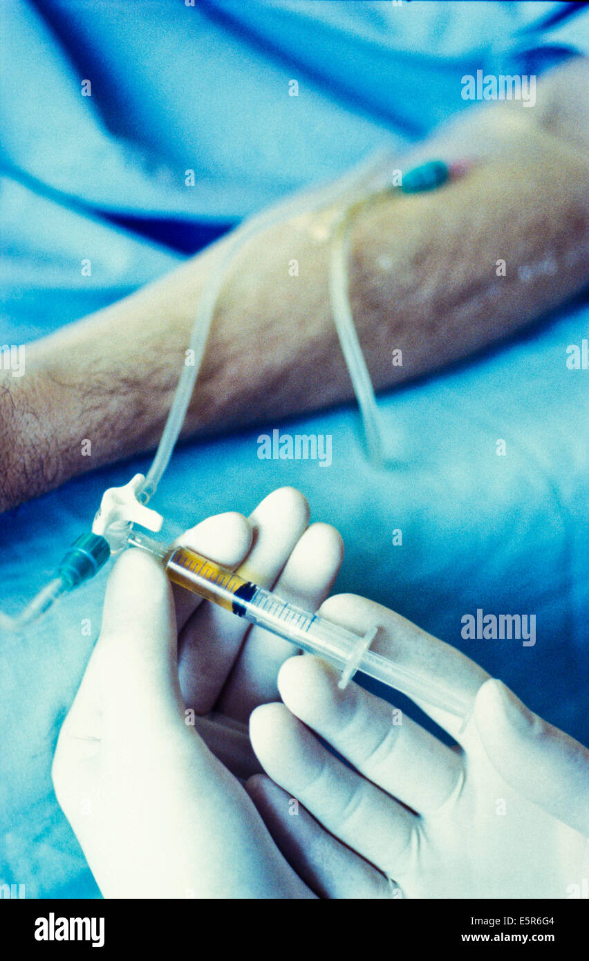 Euthanasia,Injection of drug in a drip Stock Photo - Alamy