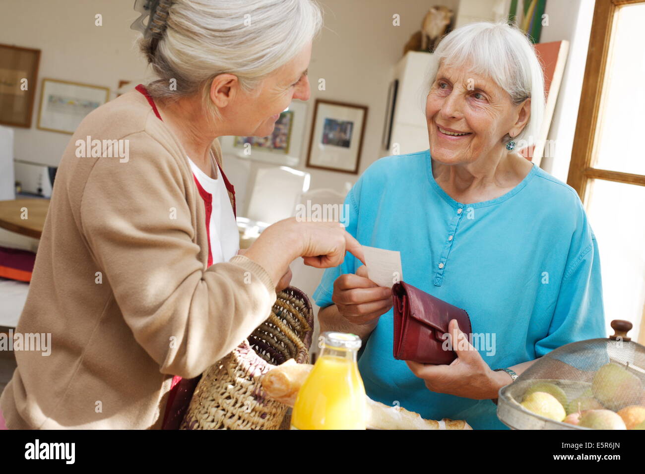 Carer helping elderly food hi-res stock photography and images - Alamy