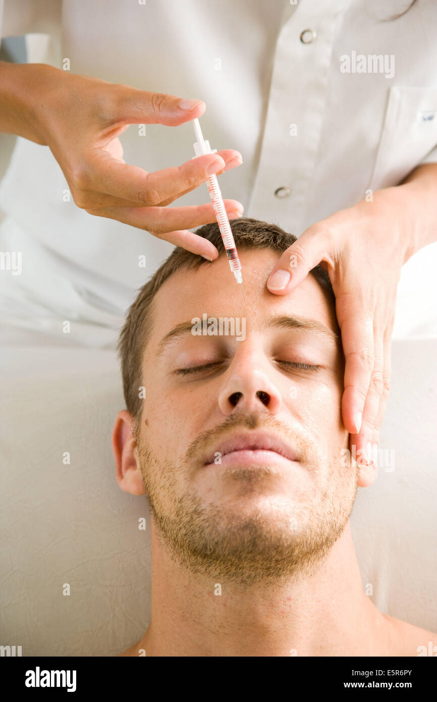 Treatment of wrinkles with Botox injections Stock Photo - Alamy