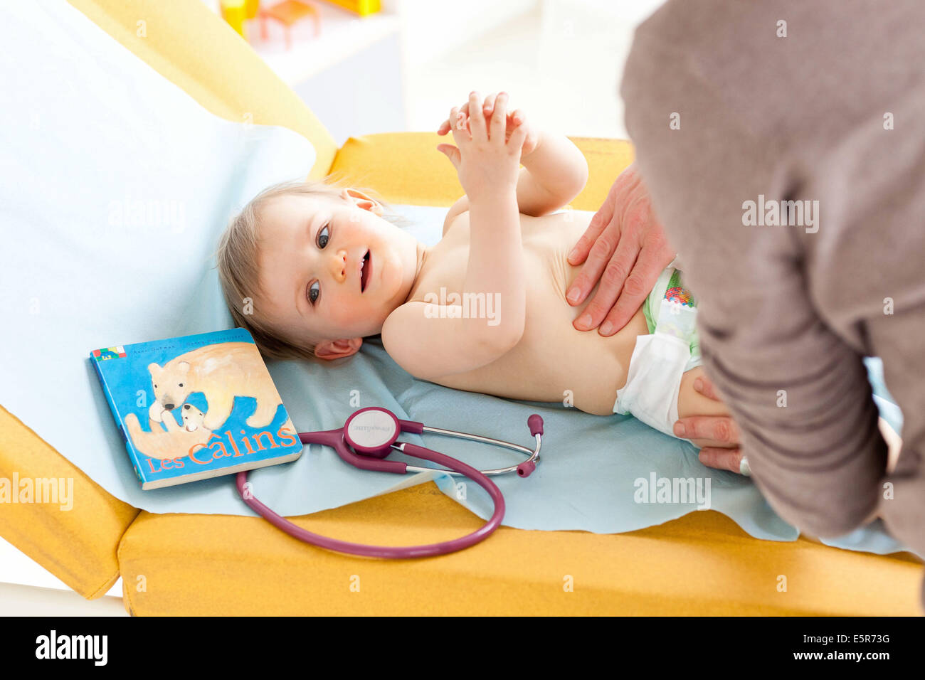 Doctor palpating the abdomen hi-res stock photography and images - Alamy