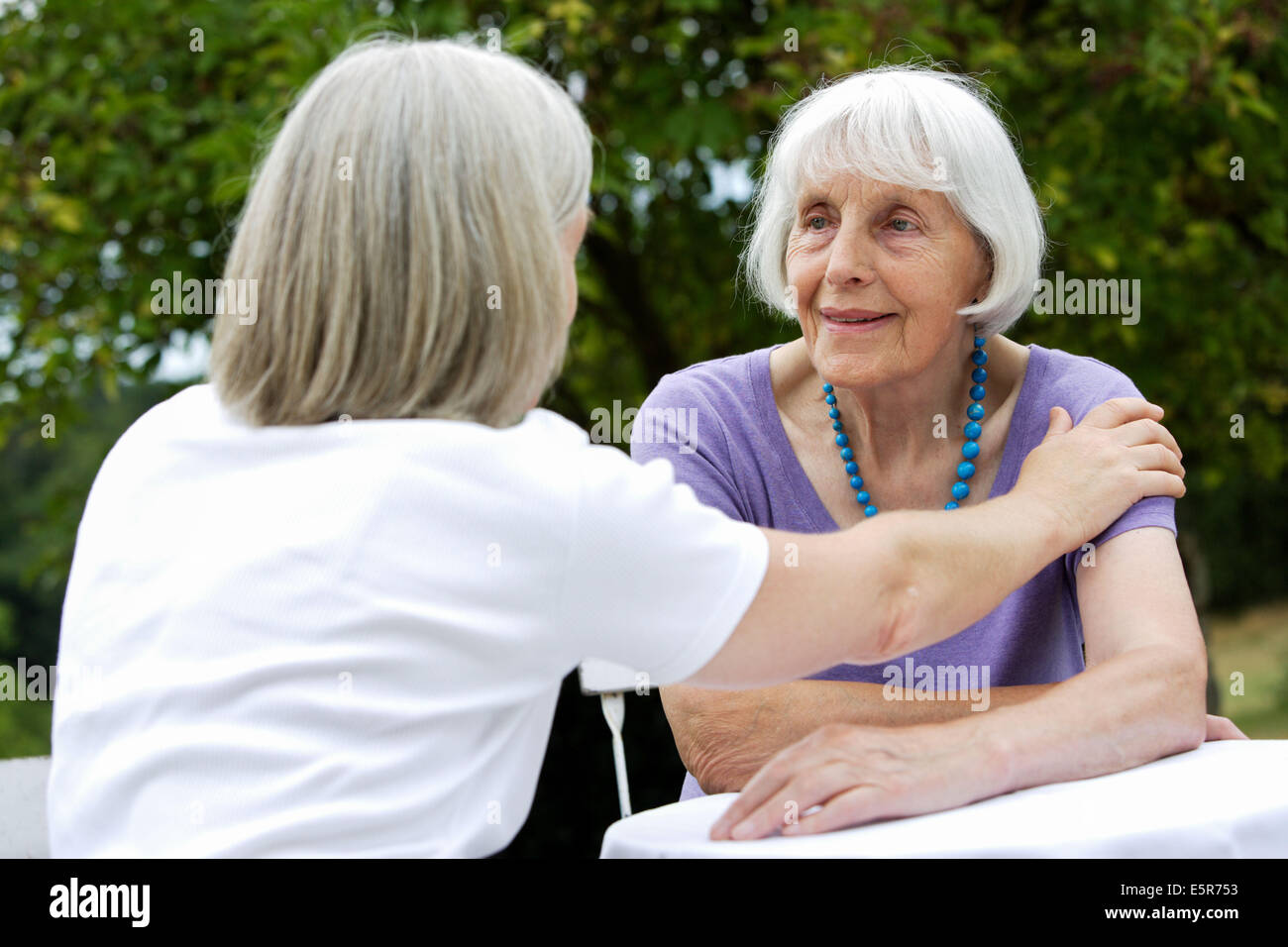 80 year old woman talking with her daughter Stock Photo - Alamy