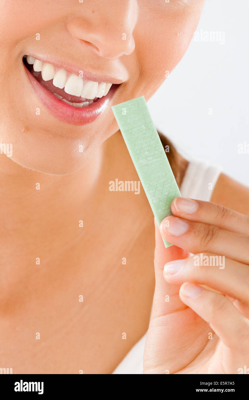 Woman eating chewing gum hi-res stock photography and images - Alamy