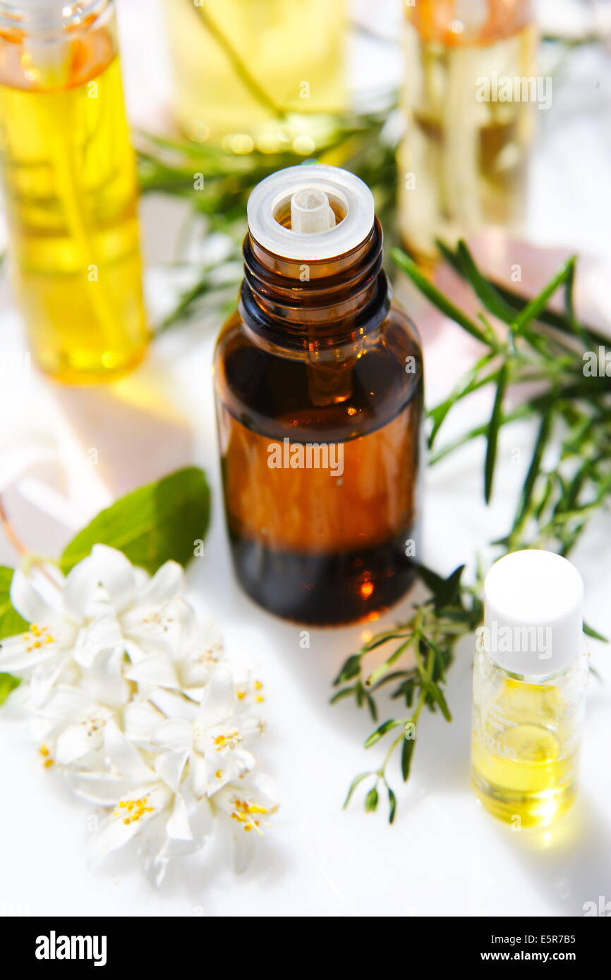 Bottles of essential oils Stock Photo - Alamy