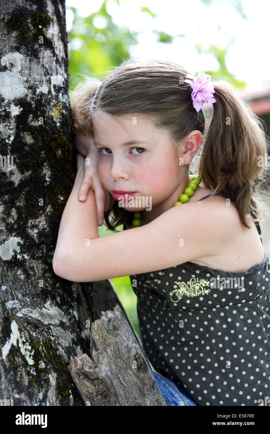 Sullen 7 year old girl Stock Photo - Alamy