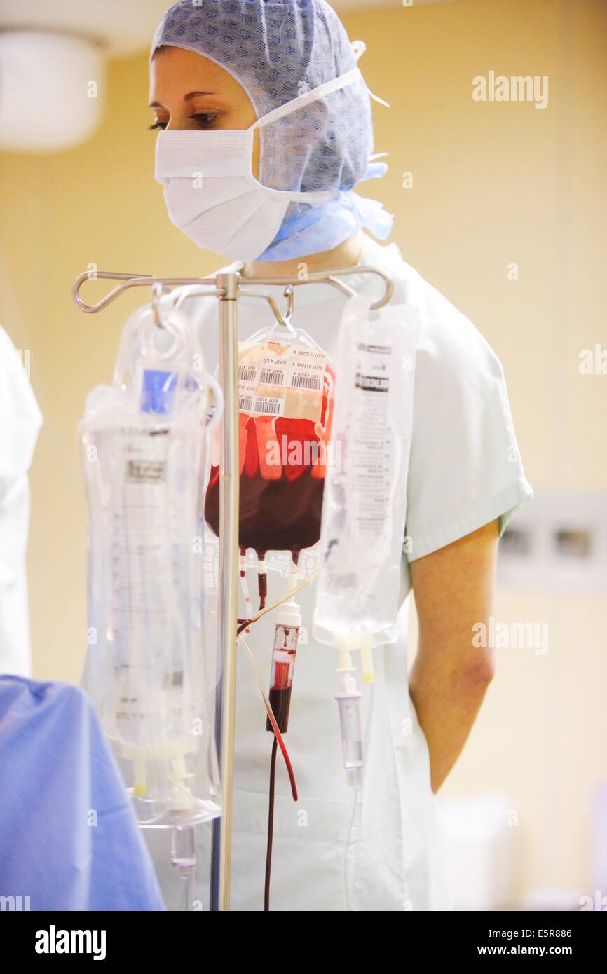 Medical student watching surgical procedure, Thoracic and ...