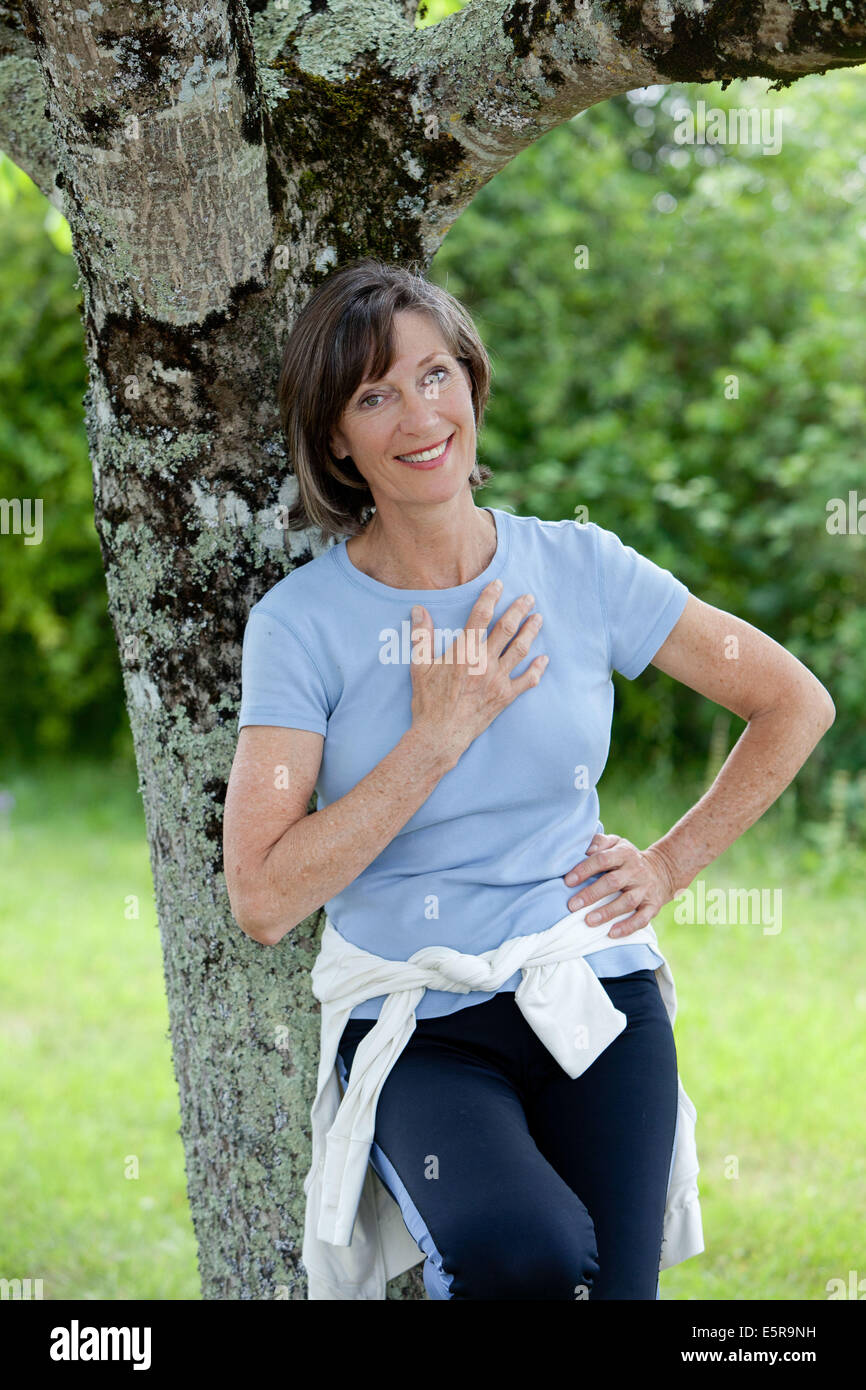 Woman out of breath because of physical activity Stock Photo - Alamy